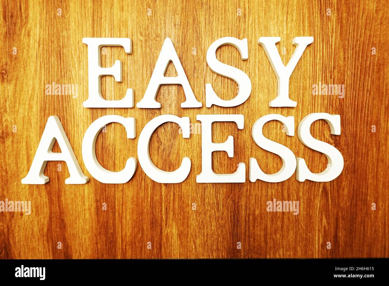 Easy Access word alphabet letters on wooden background Stock Photo - Alamy