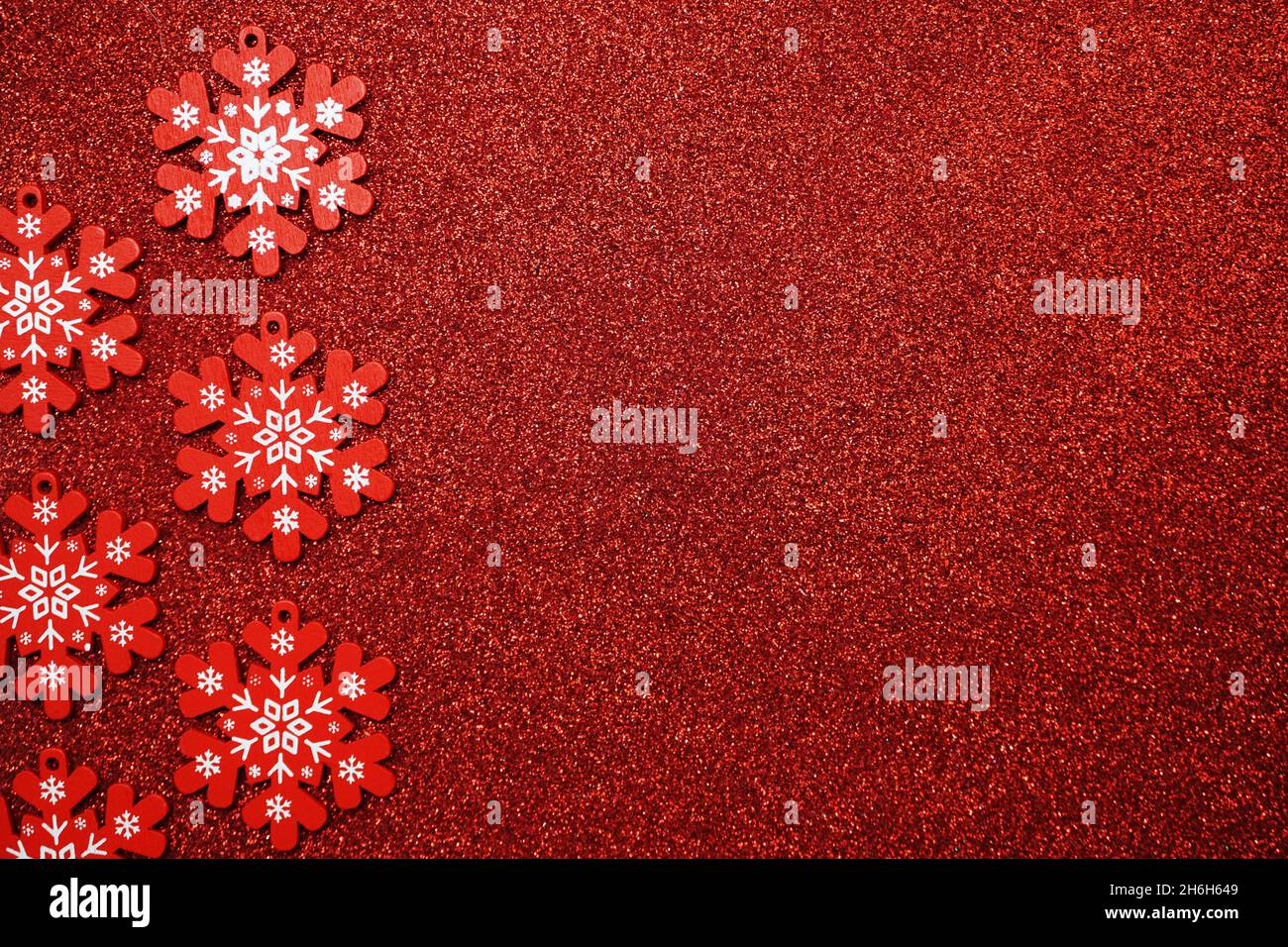 Christmas Ornament Decoration border frame on red glitter background ...