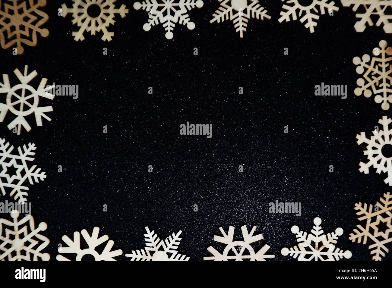 Christmas Ornament Decoration border frame on black glitter background ...