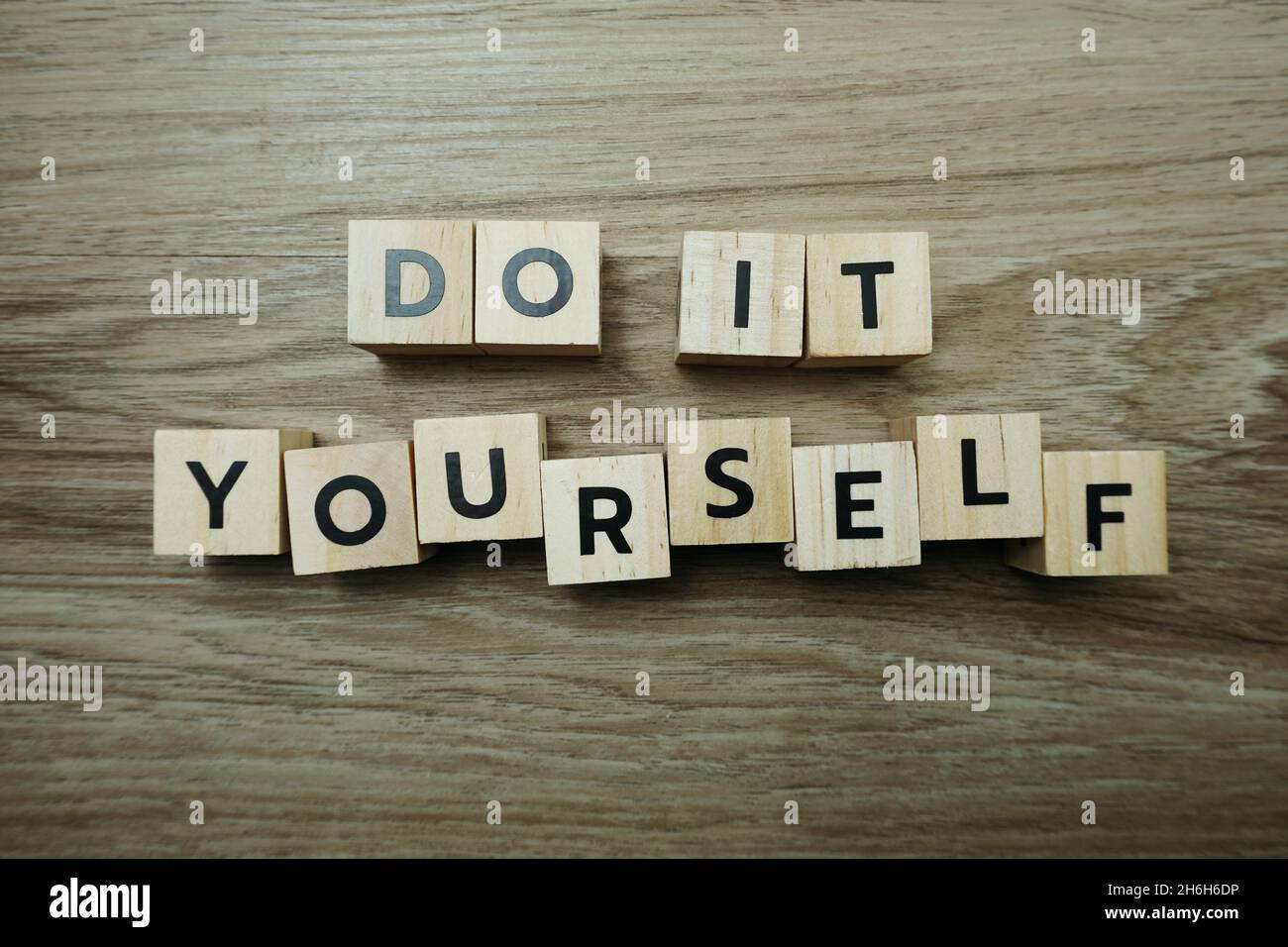 Do it Yourself alphabet letter on wooden background Stock Photo - Alamy