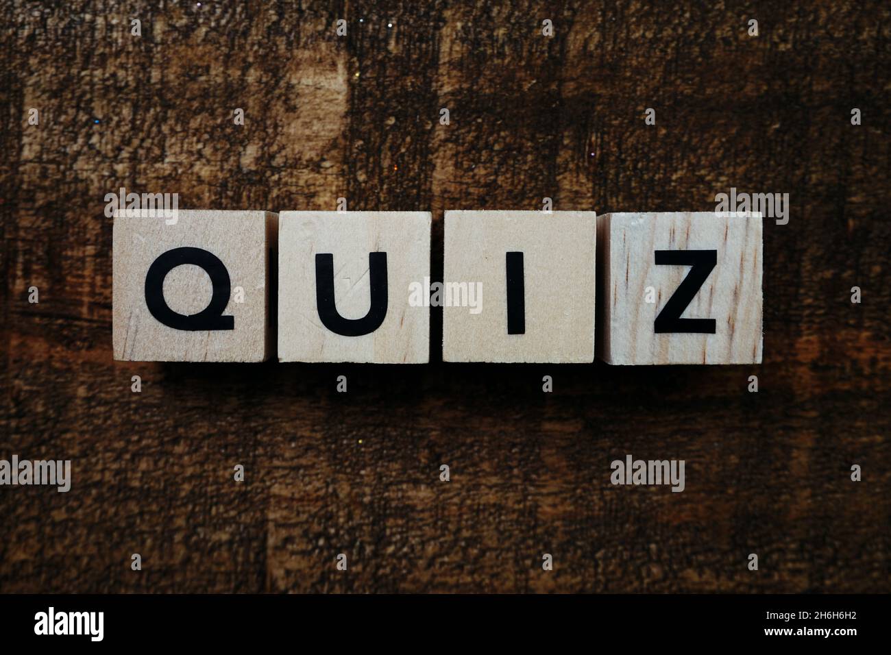 Wooden blocks spell word examination hi-res stock photography and ...