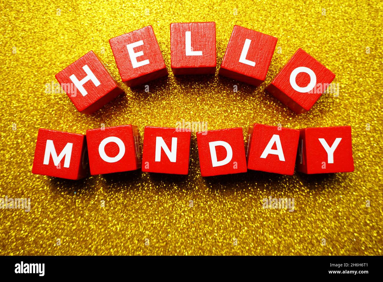 Hello Monday alphabet letter on gold glitter background Stock Photo - Alamy