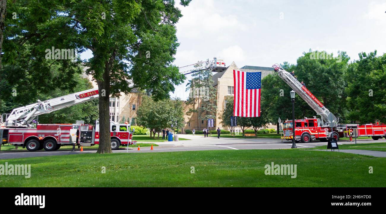 Fire engine trucks at St. Thomas University with ladders extended ...