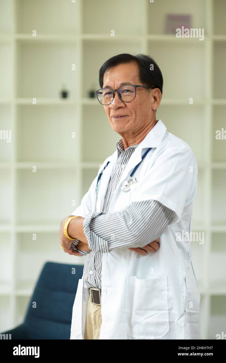 Portrait of a middle-aged male specialist and successful doctor in a ...
