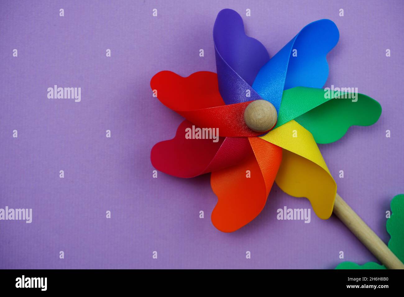 colorful pinwheel with space copy isolated on purple background Stock ...