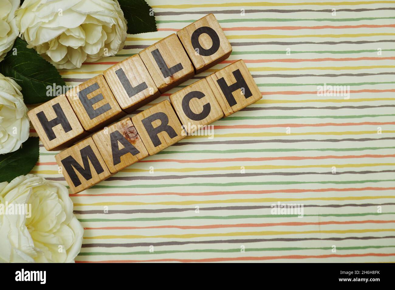 Hello March alphabet letters on colorful stripes background Stock Photo ...