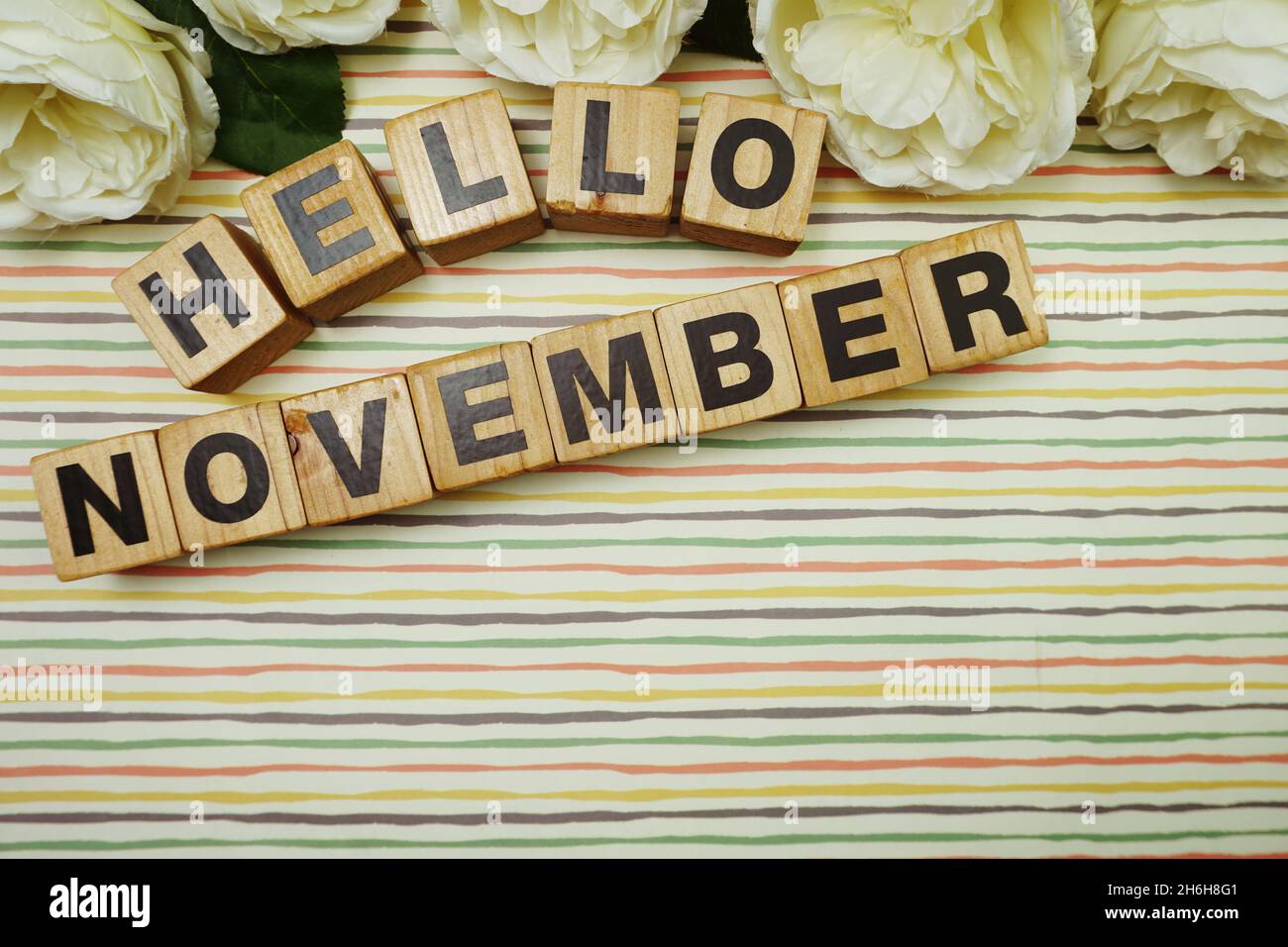 Hello November alphabet letters on colorful stripes background Stock ...