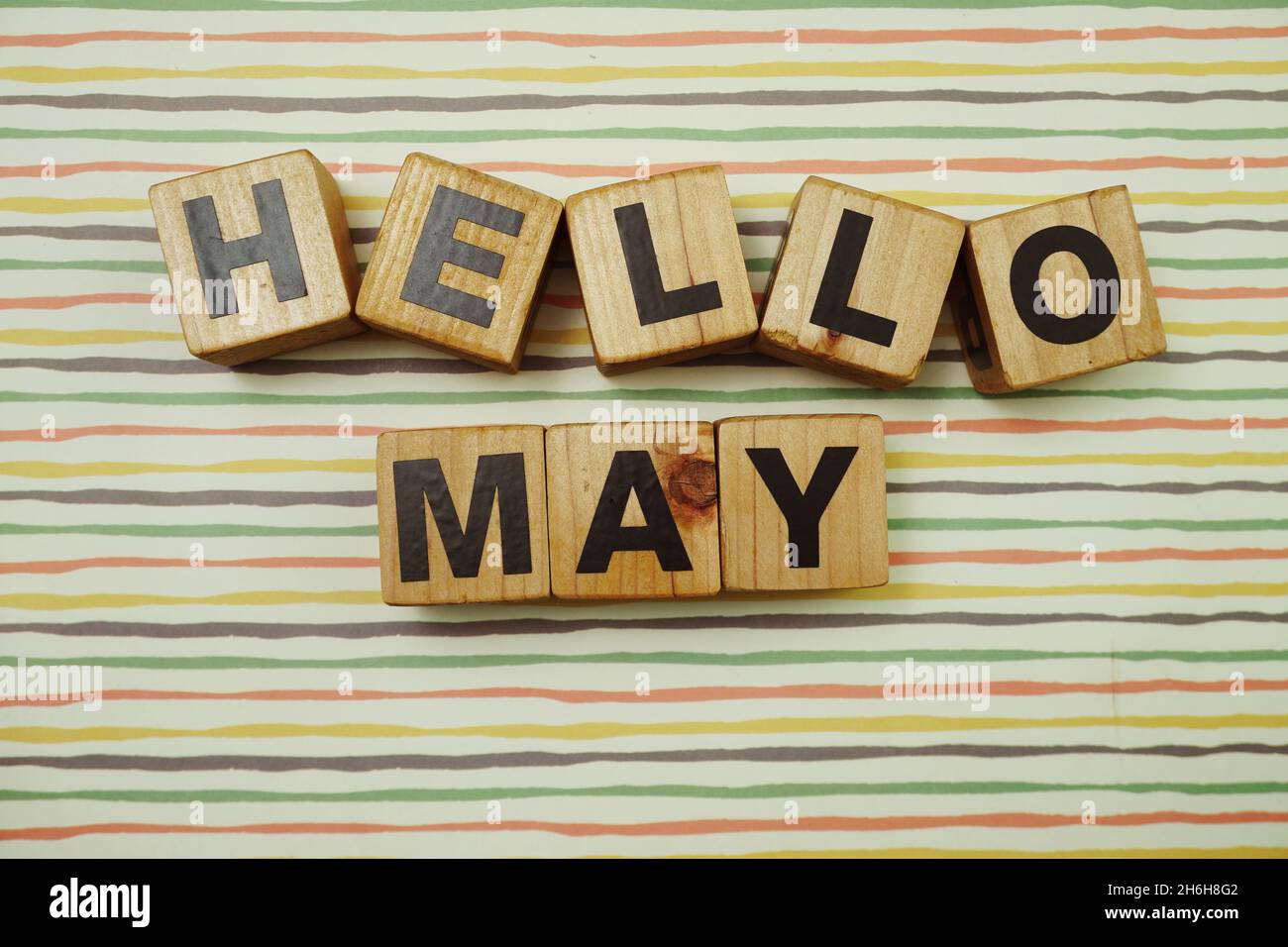 Hello May alphabet letters on colorful stripes background Stock Photo ...