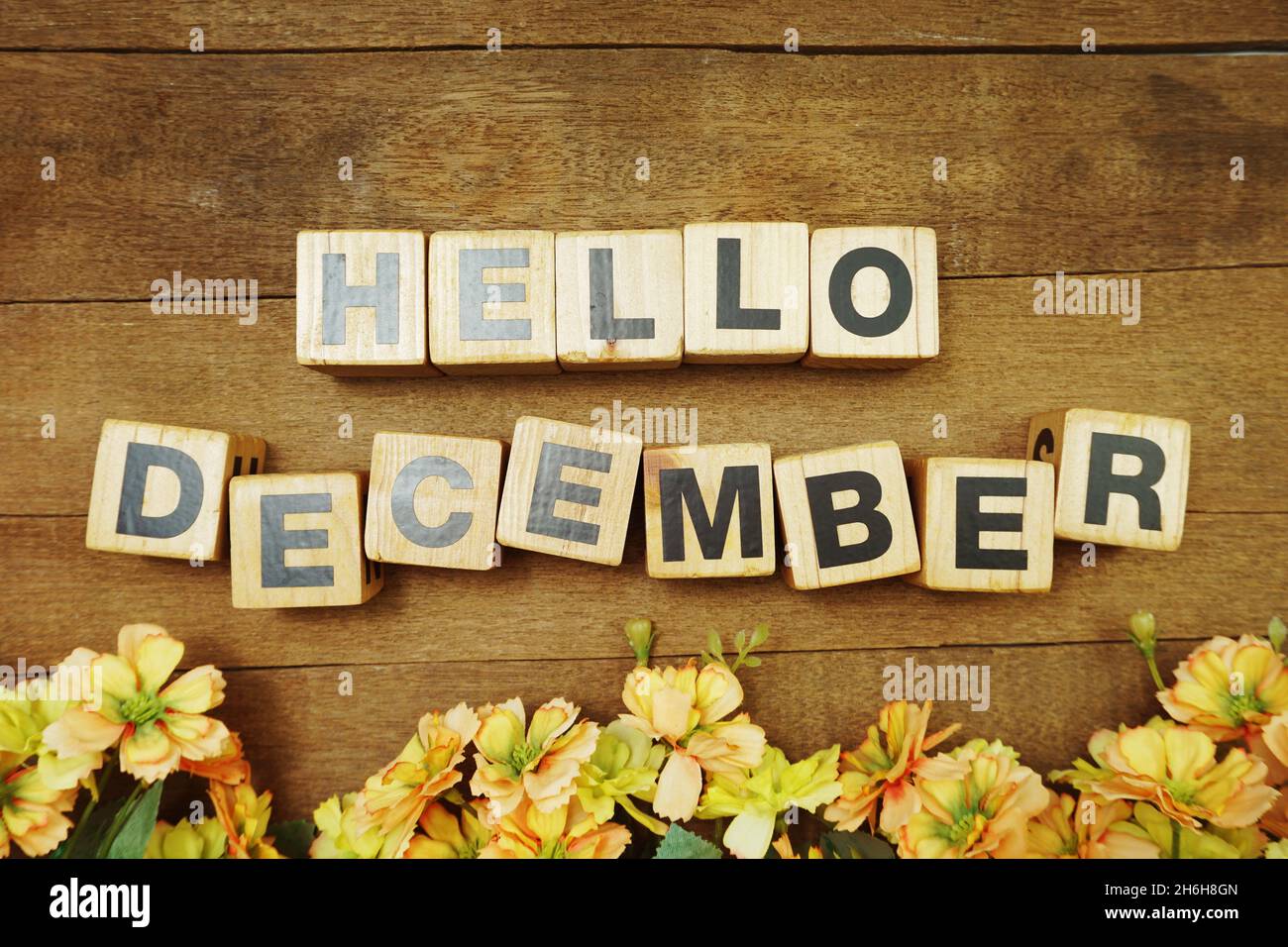 Hello December alphabet letters on wooden background Stock Photo - Alamy