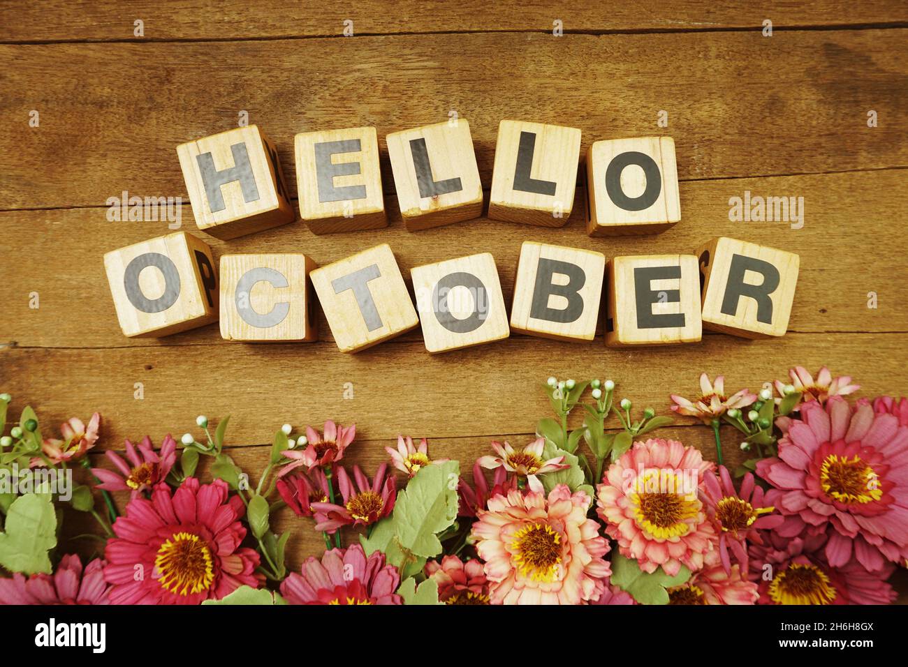Hello October alphabet letters on wooden background Stock Photo - Alamy