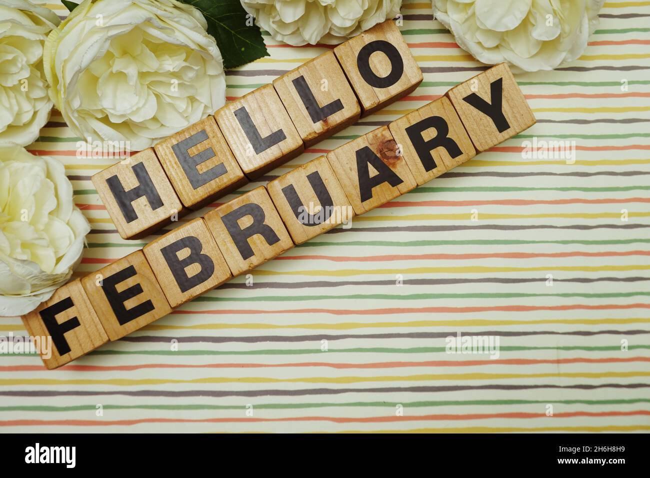 Hello February alphabet letters on colorful stripes background Stock ...