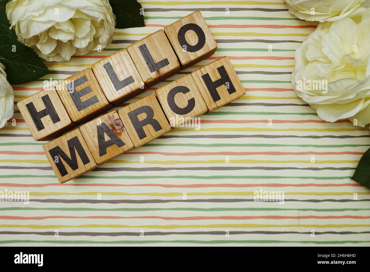 Hello March alphabet letters on colorful stripes background Stock Photo ...