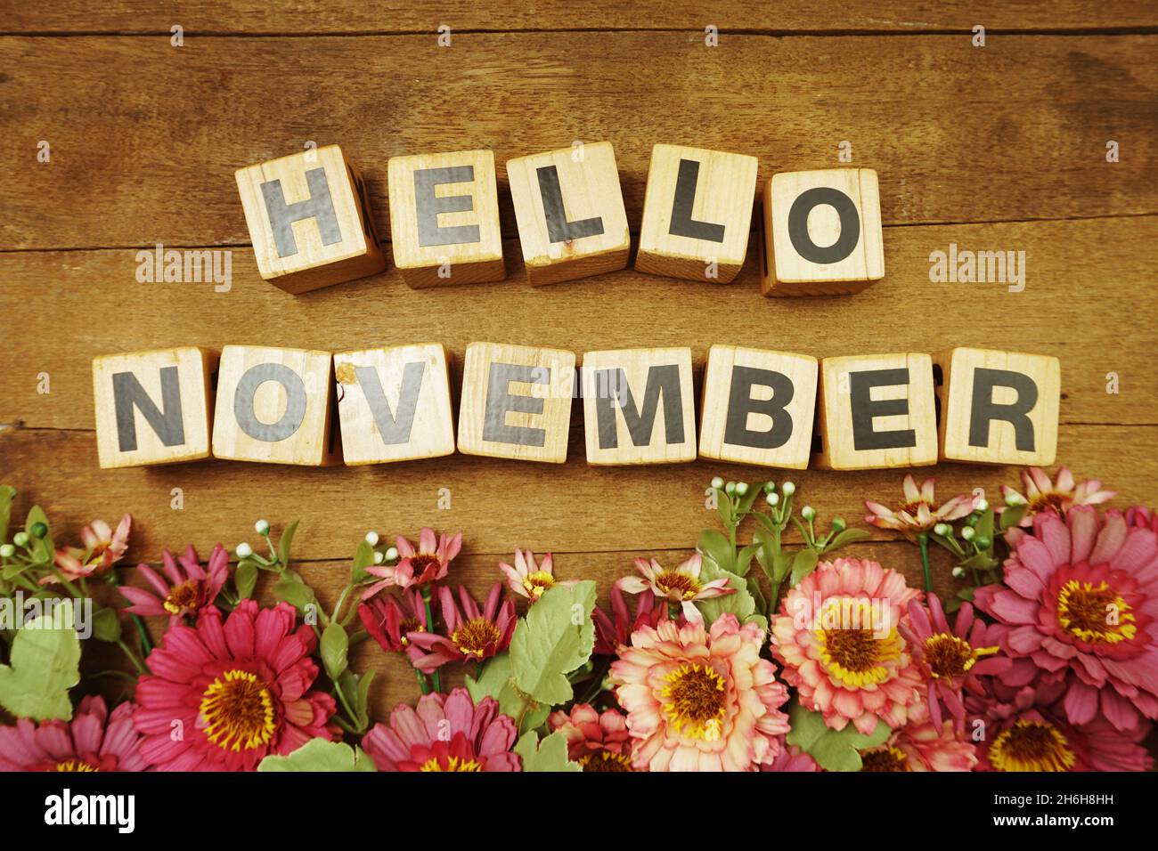 Hello November alphabet letters on wooden background Stock Photo - Alamy