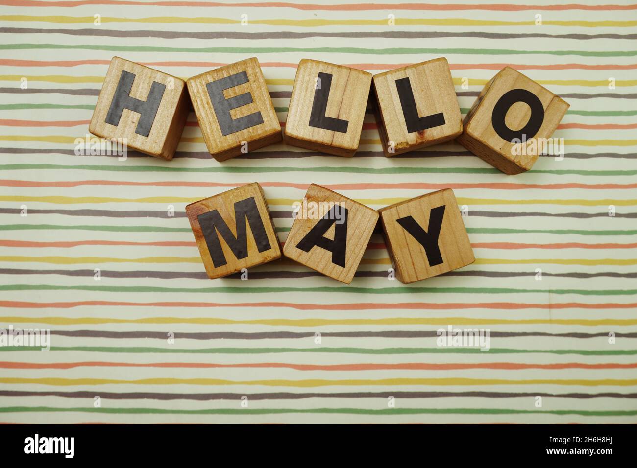 Hello May alphabet letters on colorful stripes background Stock Photo ...