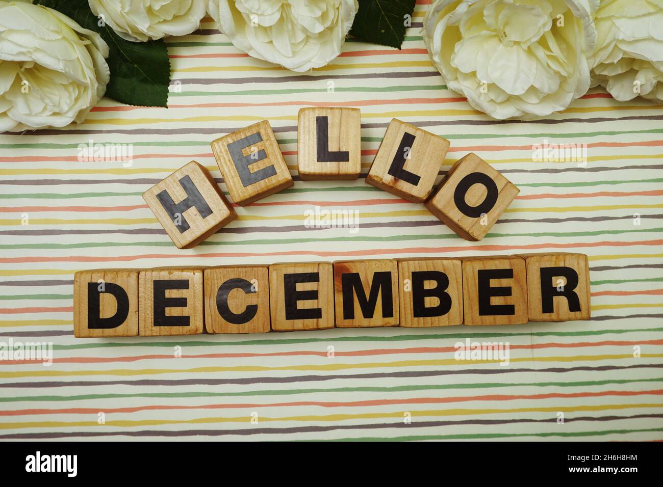 Hello December alphabet letters on colorful stripes background Stock ...