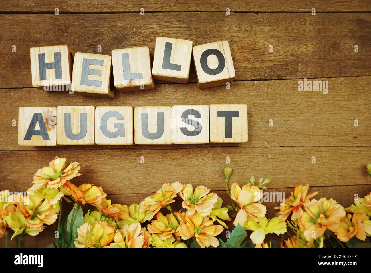 Hello August alphabet letters on wooden background Stock Photo - Alamy