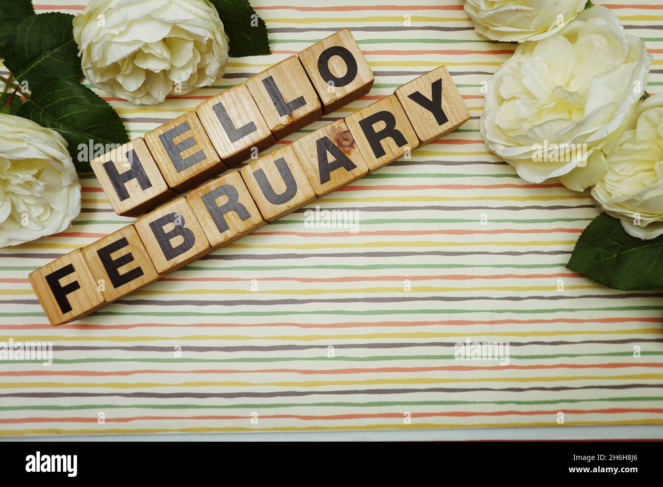 Hello February alphabet letters on colorful stripes background Stock ...