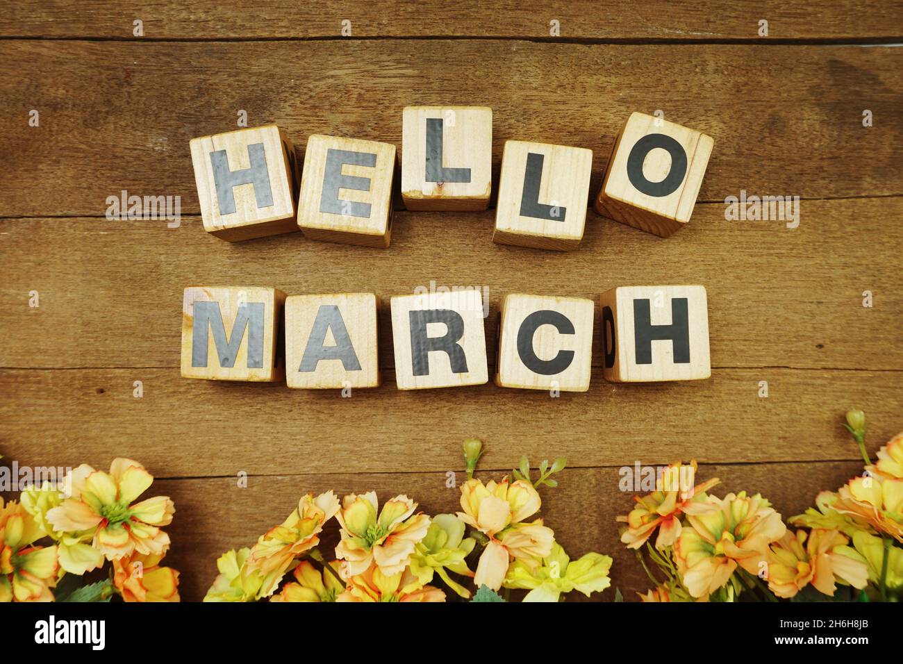 Hello March alphabet letters on wooden background Stock Photo - Alamy