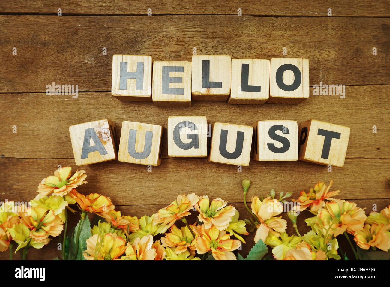 Hello August alphabet letters on wooden background Stock Photo - Alamy