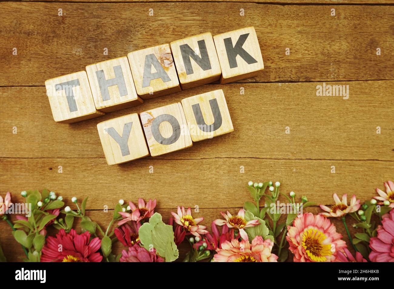 Thank You alphabet letters on wooden background Stock Photo - Alamy