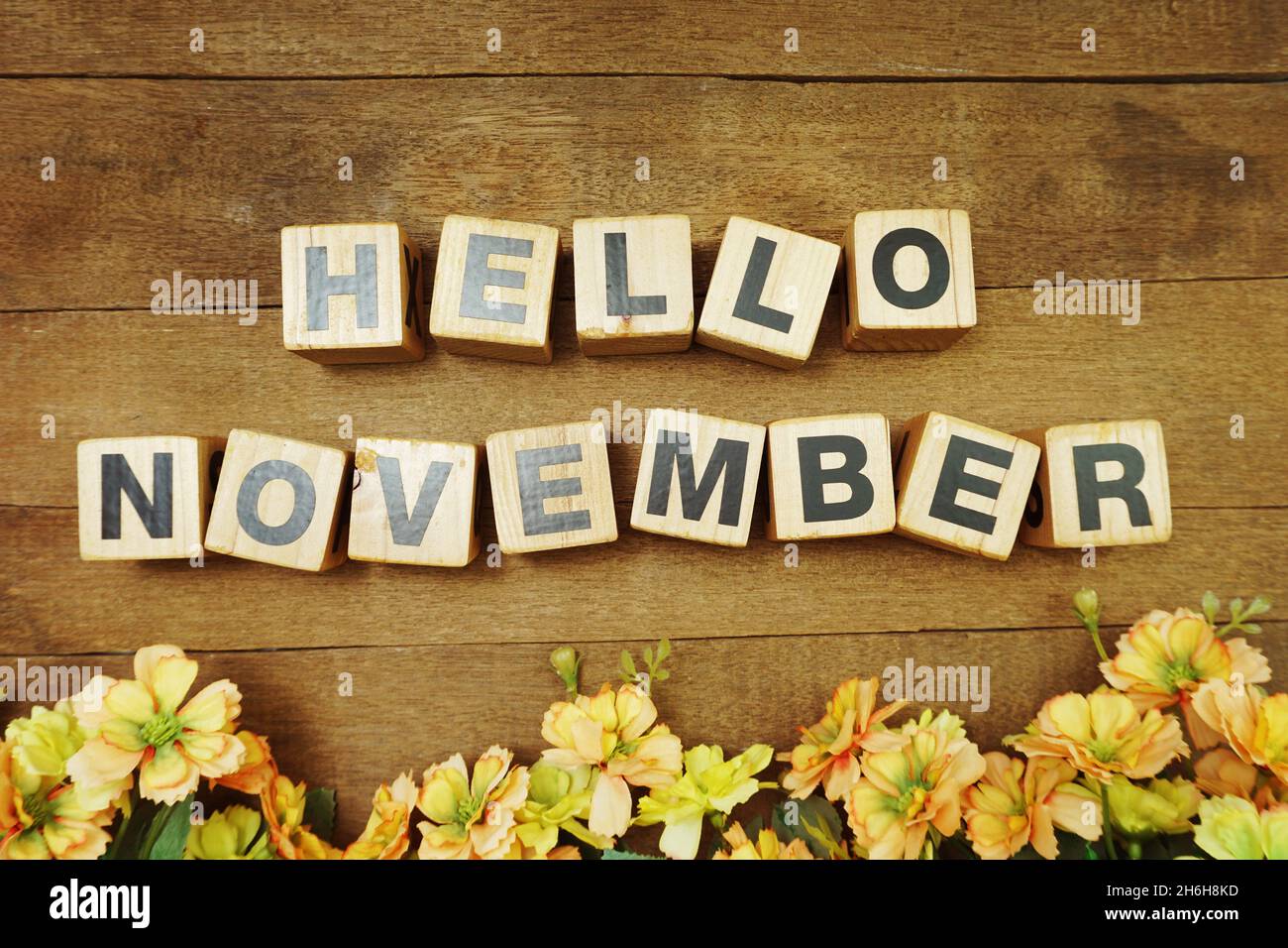 Hello November alphabet letters on wooden background Stock Photo - Alamy