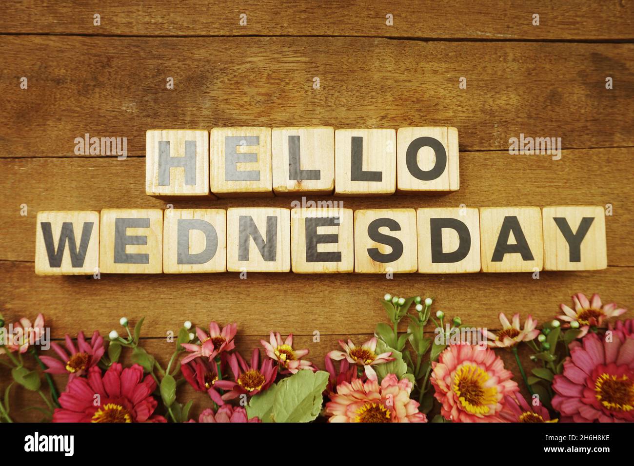 hello wednesday alphabet letters on wooden background Stock Photo - Alamy