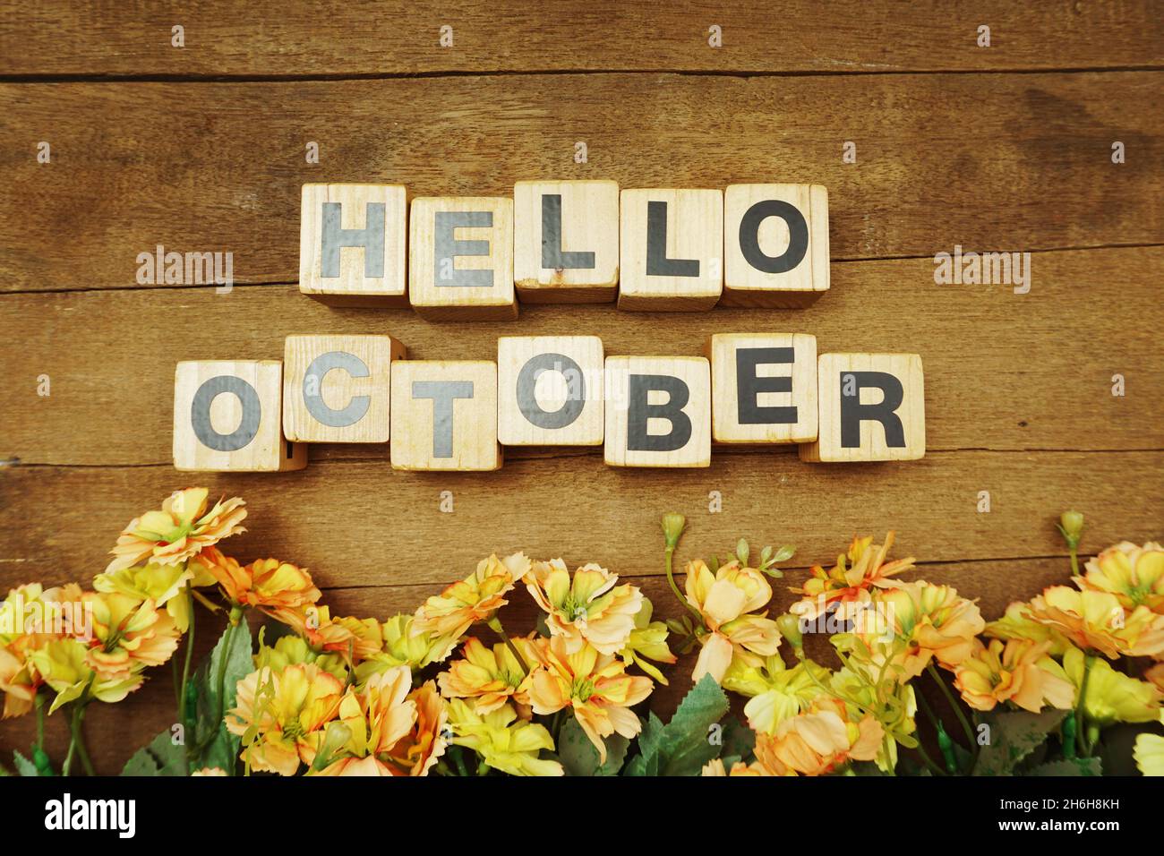 Hello October alphabet letters on wooden background Stock Photo - Alamy