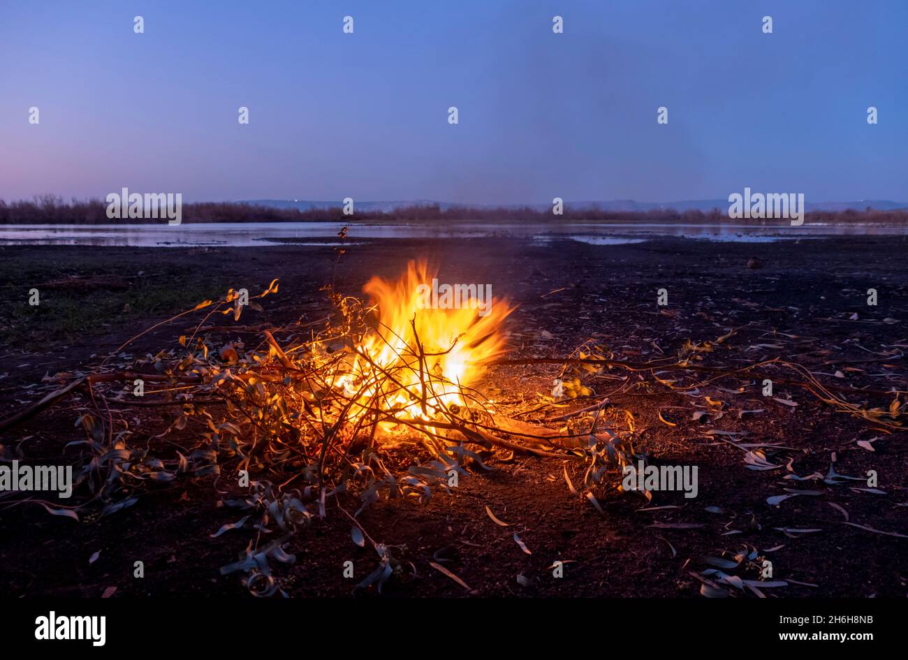 Campfire at the eastern shore of the Sea of Galilee in Israel Stock ...