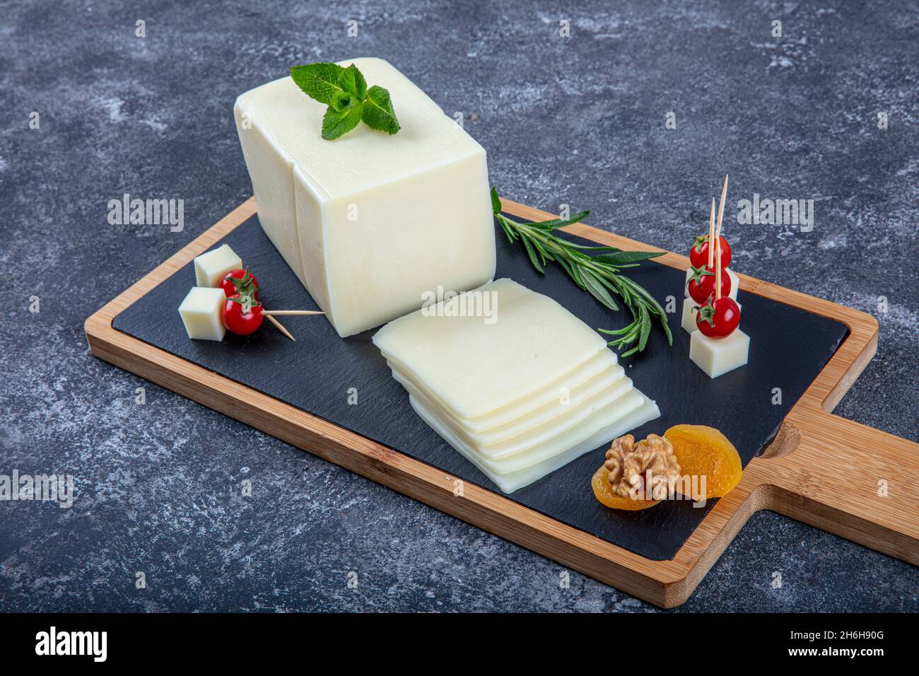 Kashar cheese or kashkaval cheese. Sliced Cheddar Cheese. gourmet ...