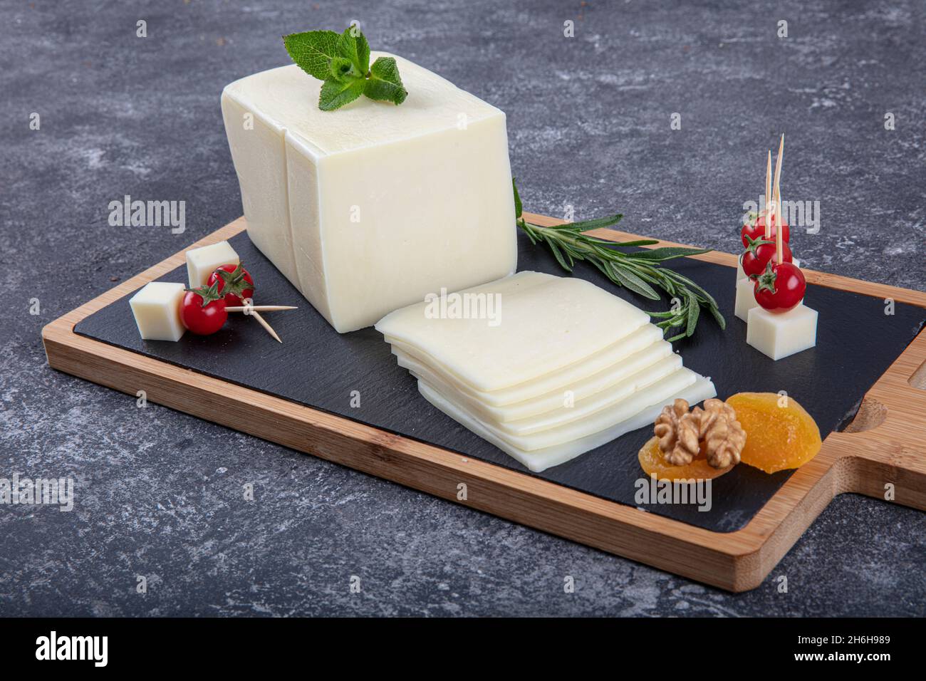 Kashar cheese or kashkaval cheese. Sliced Cheddar Cheese. gourmet ...