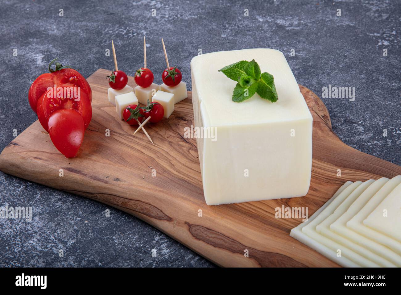 Kashar cheese or kashkaval cheese. Sliced Cheddar Cheese. gourmet ...