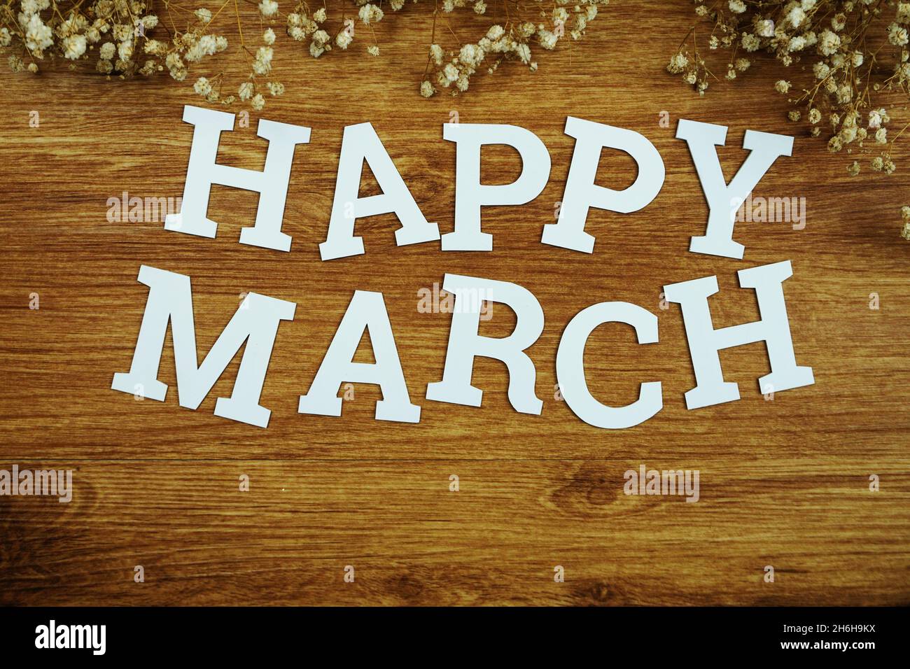 Happy March alphabet letter with space copy on wooden background Stock ...