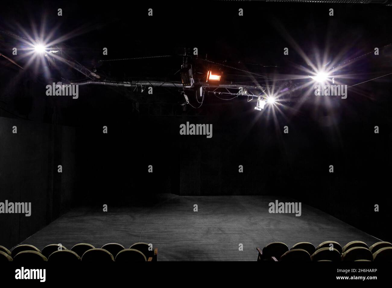 Image of a small auditorium with green armchairs Stock Photo - Alamy