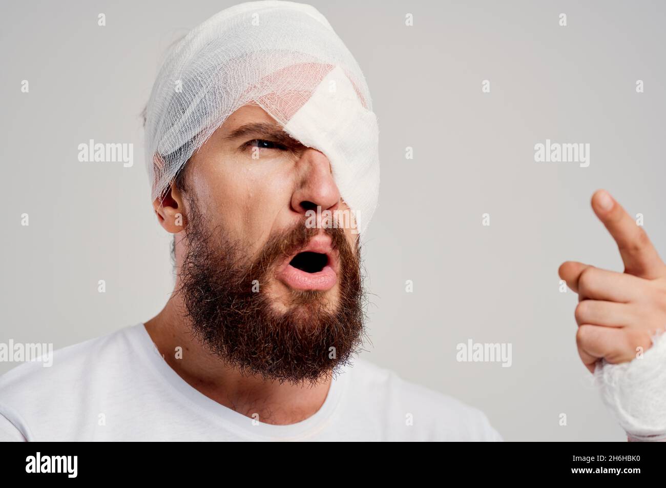 patient in a white t-shirt trauma health diagnosis light background ...