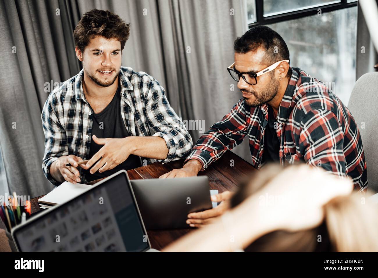 Group of young people working together. Creative business people in ...