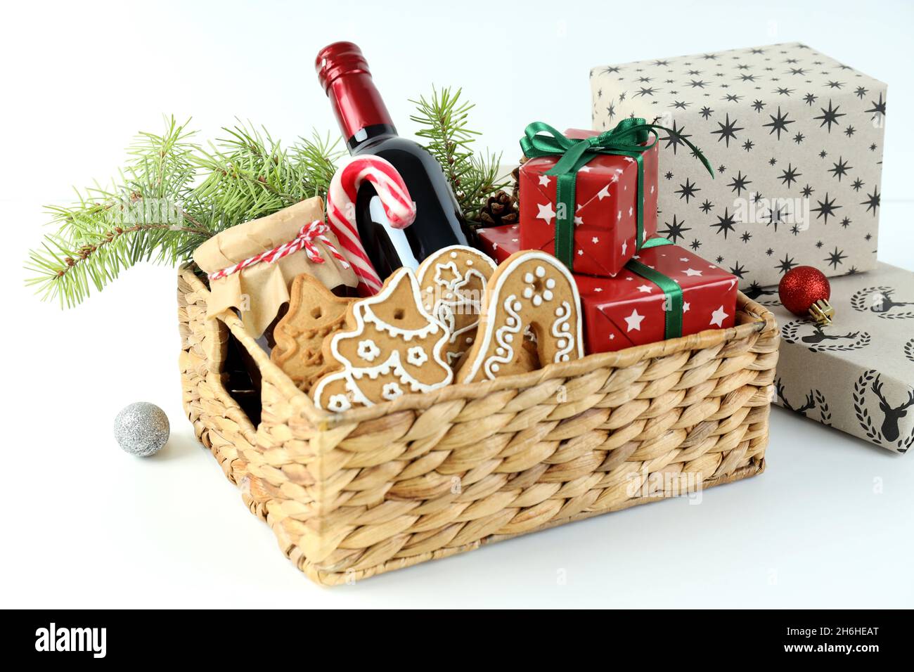 Concept of gift with Christmas basket on white background Stock Photo ...
