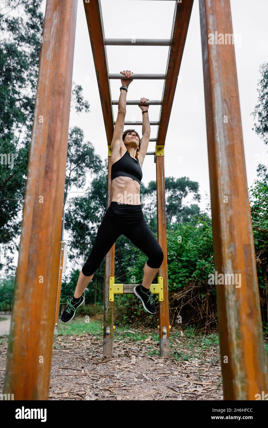 Female athlete doing monkey exercises Stock Photo - Alamy