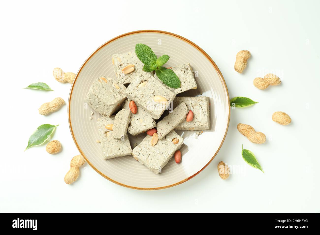 Concept of tasty food with halva on white background Stock Photo - Alamy