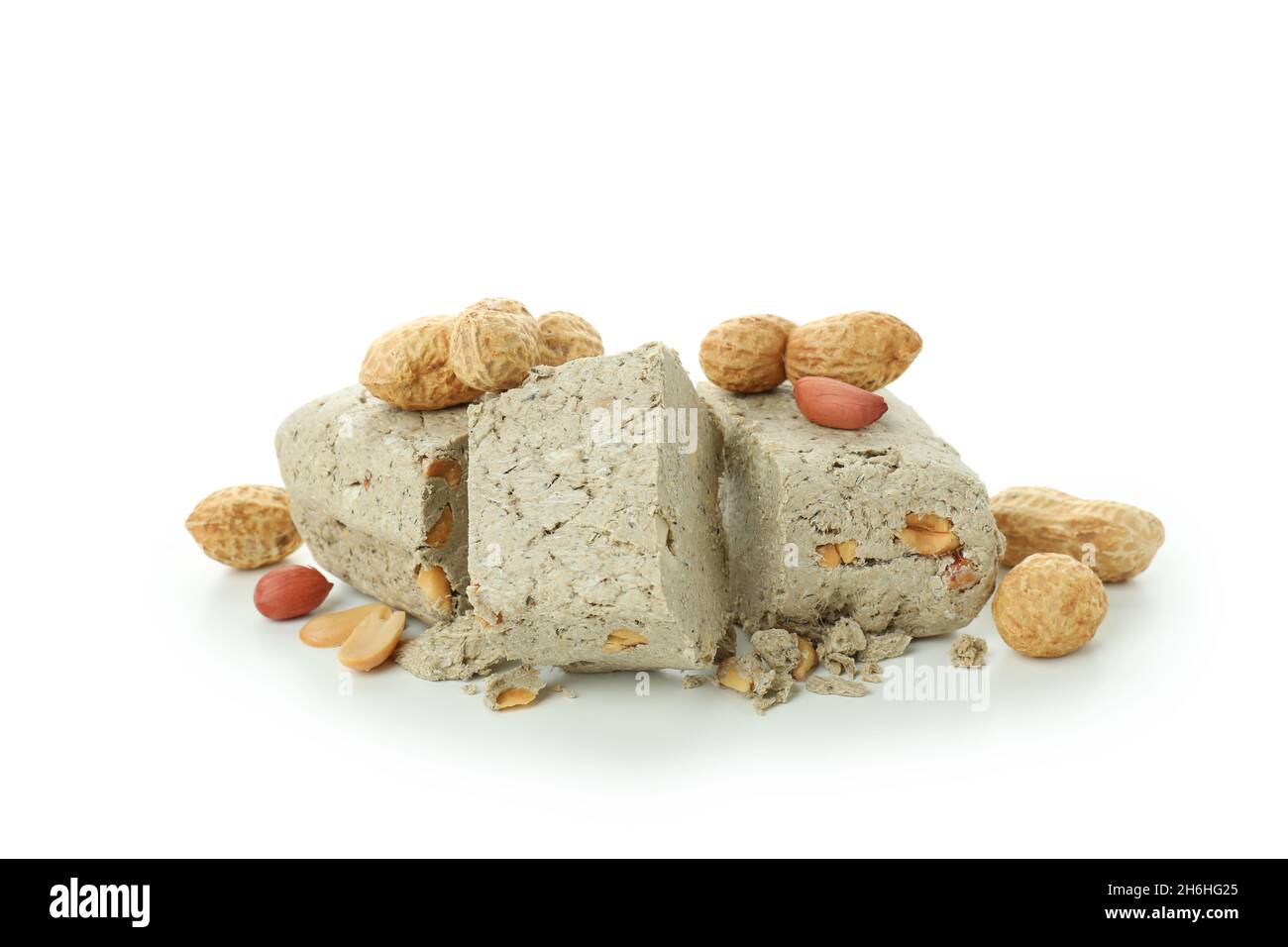 Halva with nuts isolated on white background Stock Photo - Alamy