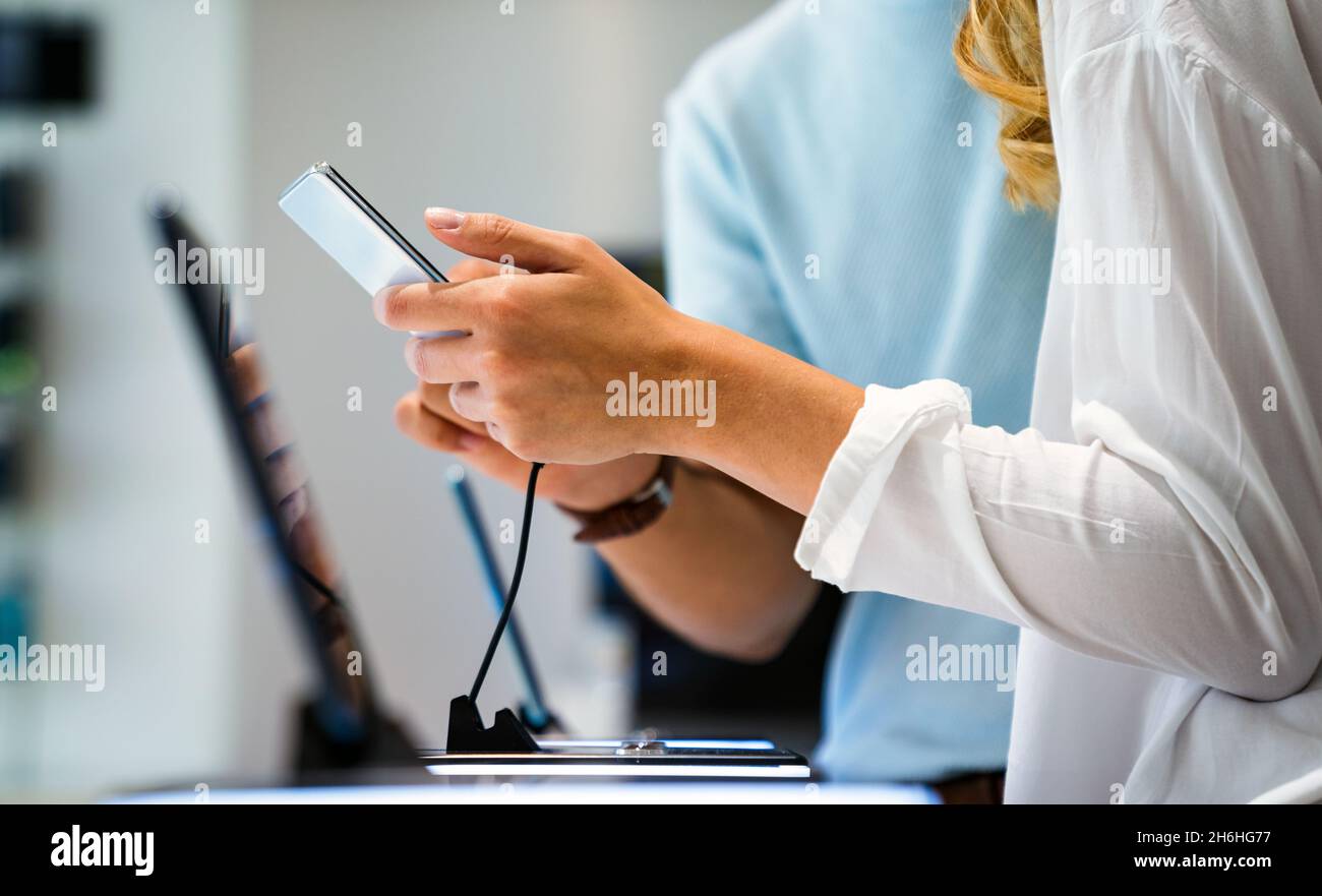 Tech shopping device gadget concept. Happy young people buying a new ...