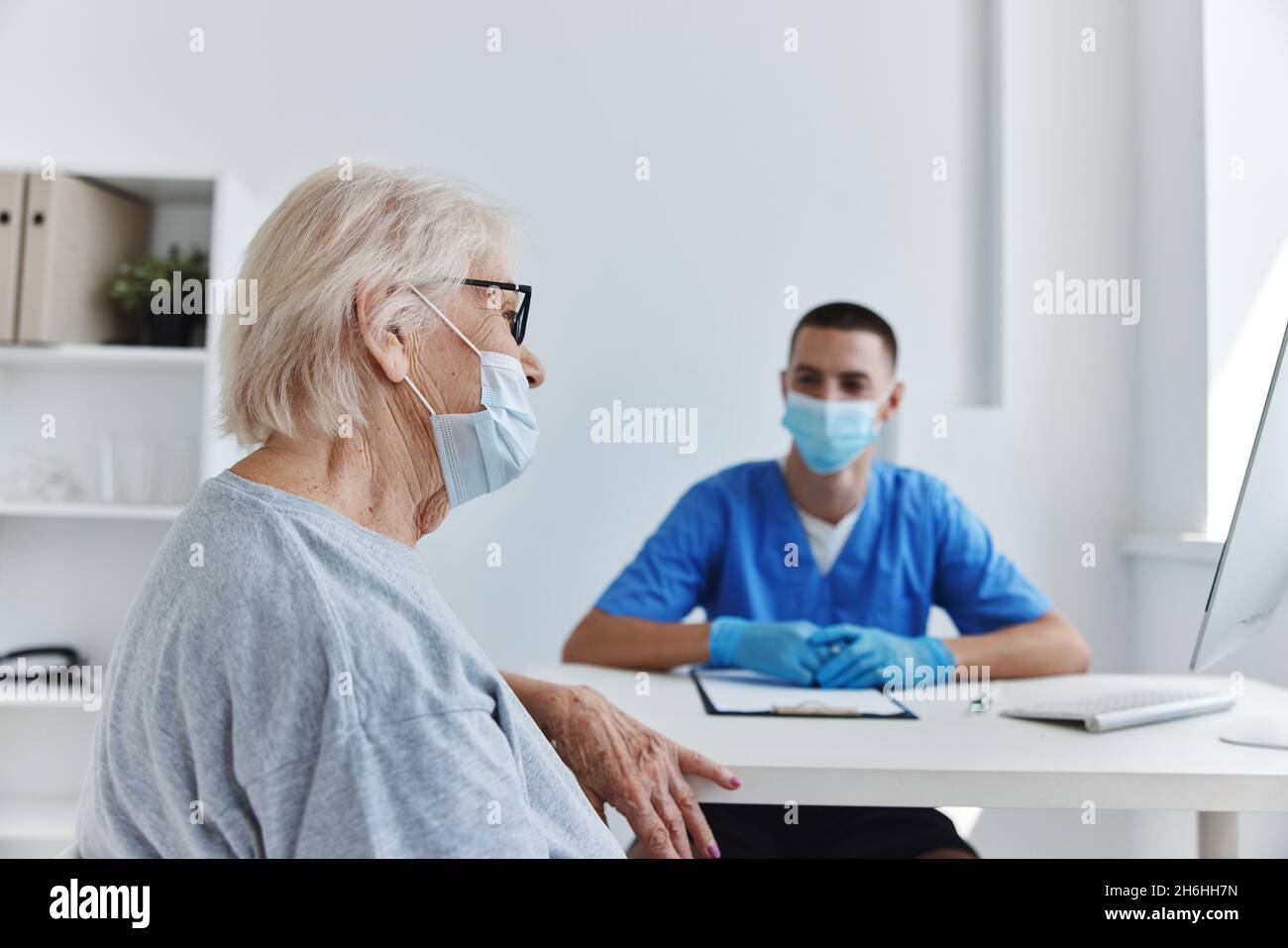 patient at the doctor's and nurse's appointments in the medical office ...