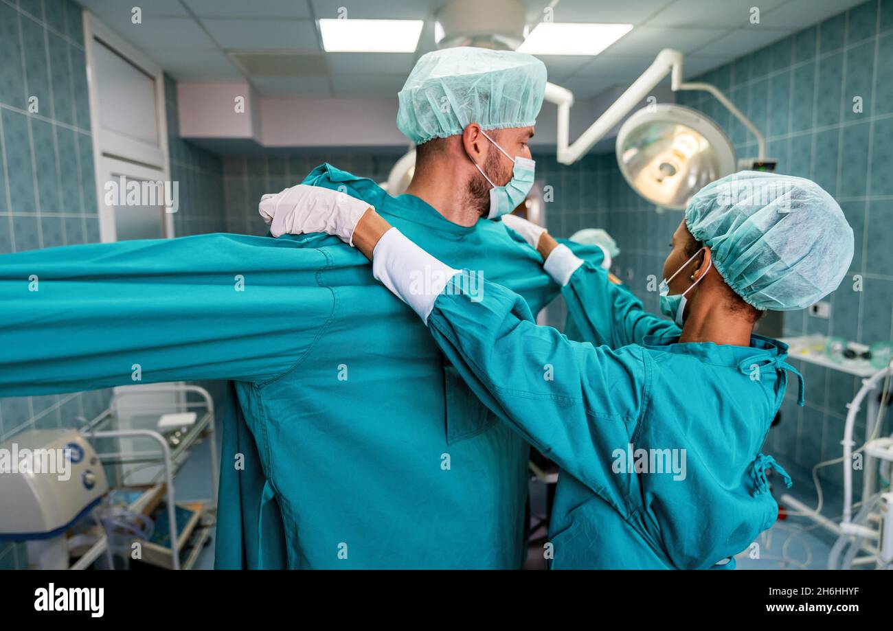 Team of surgeons in the operating room preparing for surgery Stock ...