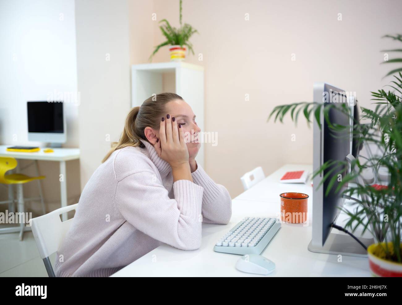 young woman is sad at the workplace. office work concep Stock Photo - Alamy