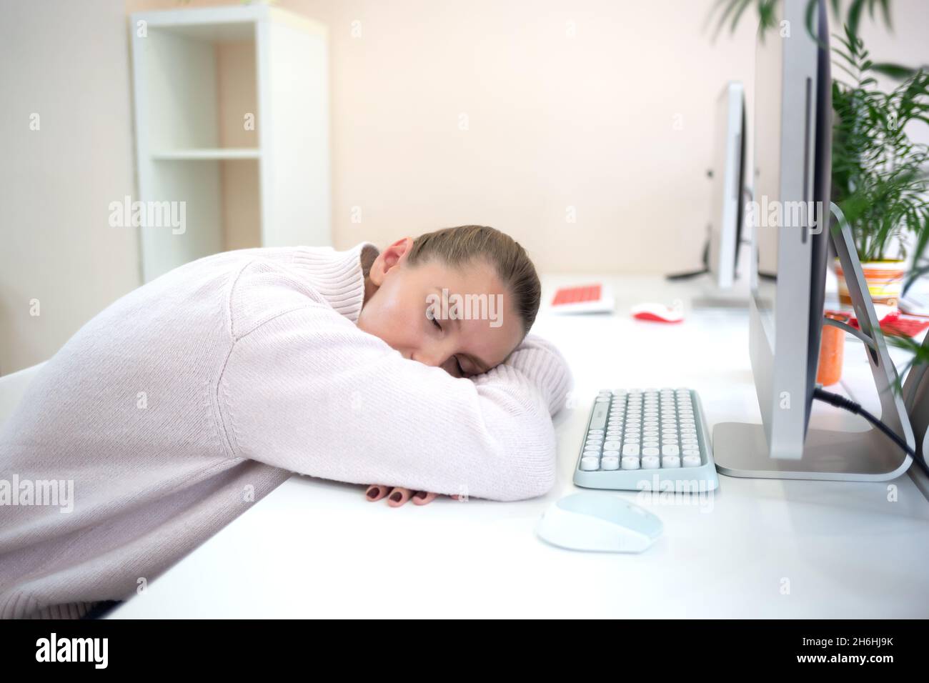 young woman is sad at the workplace. office work concep Stock Photo - Alamy
