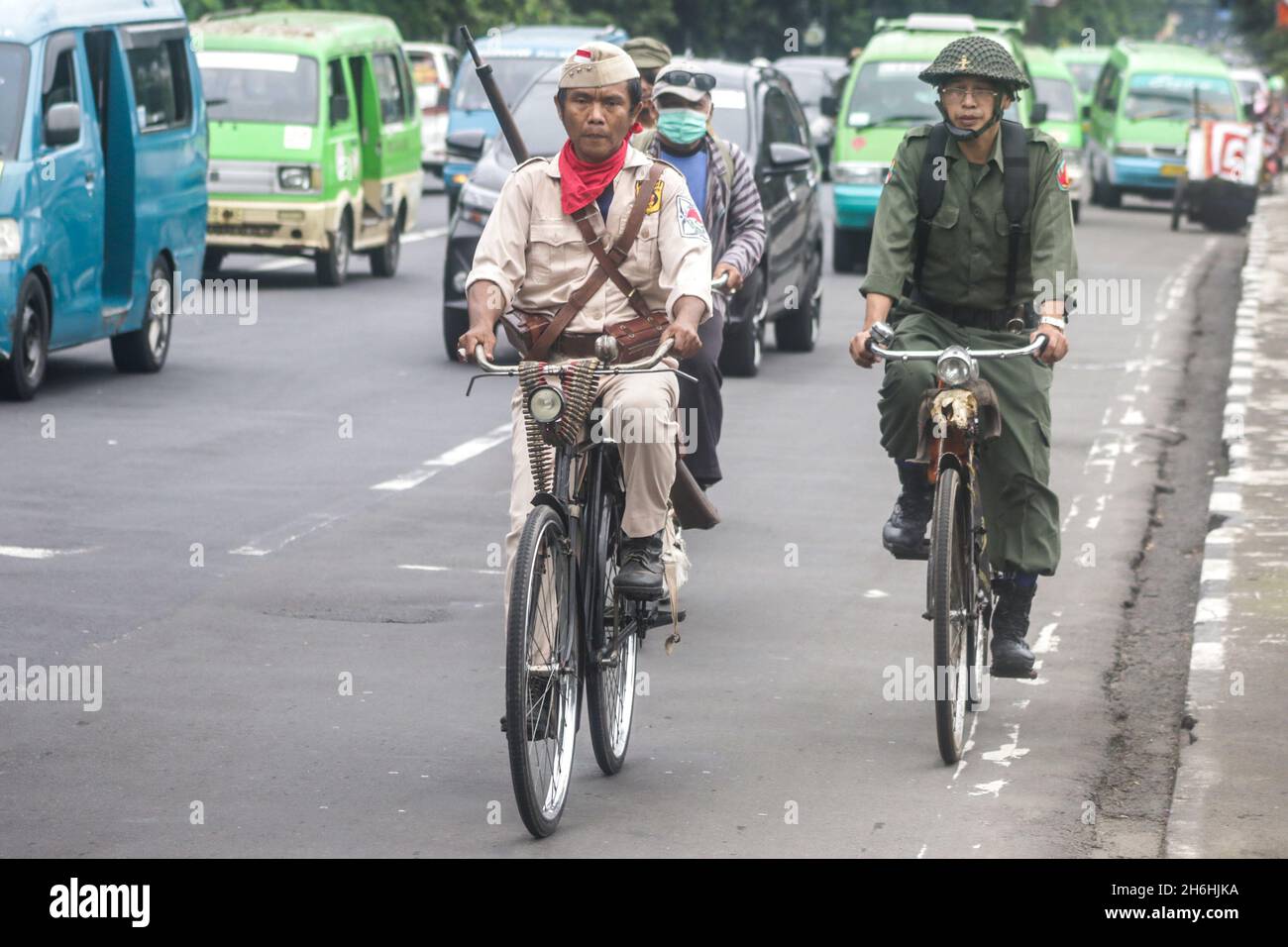 Bogor onthel bicycle community wearing Indonesian Heroes costume takes ...
