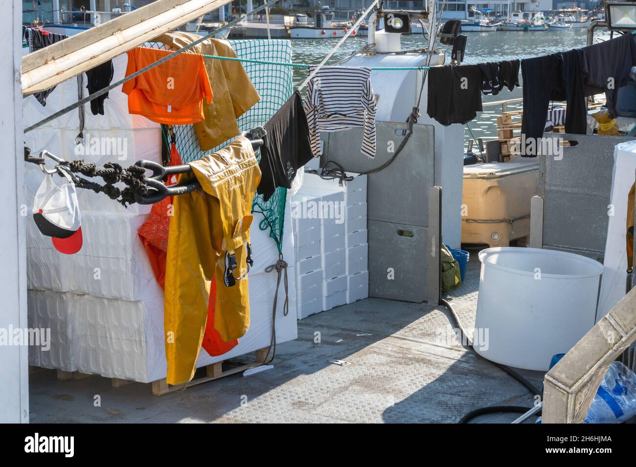 Bunch of clothes hanging on clotheslines near the harbor Stock Photo ...