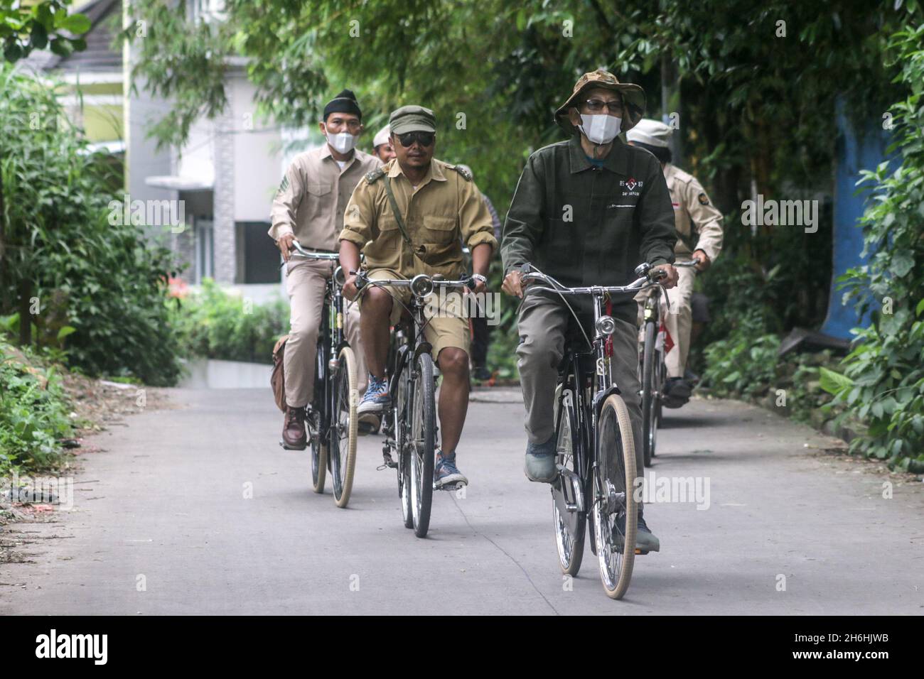 Bogor onthel bicycle community wearing Indonesian Heroes costume takes ...