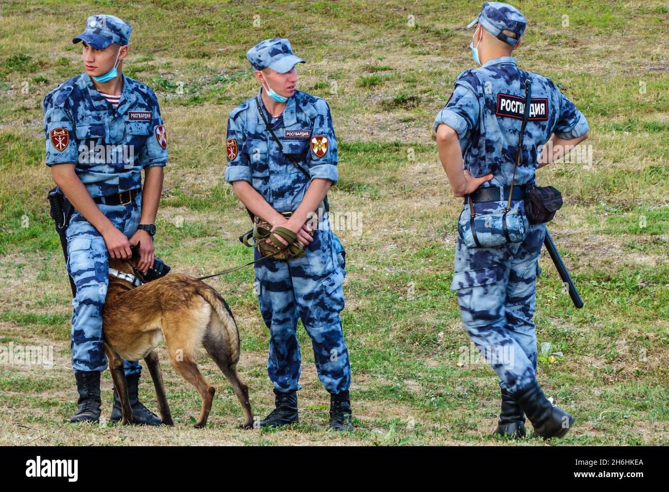 Security guard in blue uniform hi-res stock photography and images - Alamy