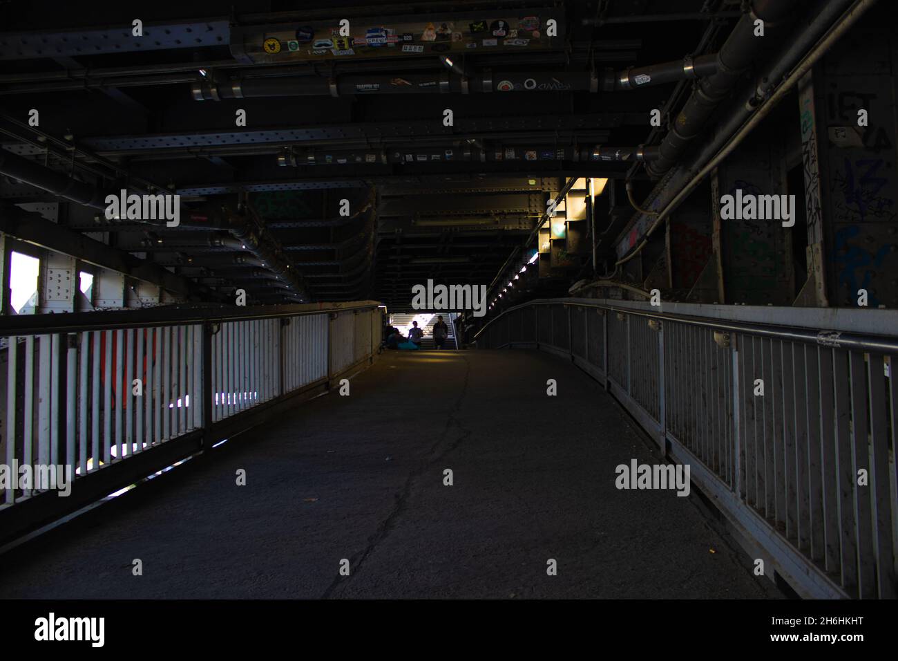 Old bridge in a station with metal railings Stock Photo - Alamy