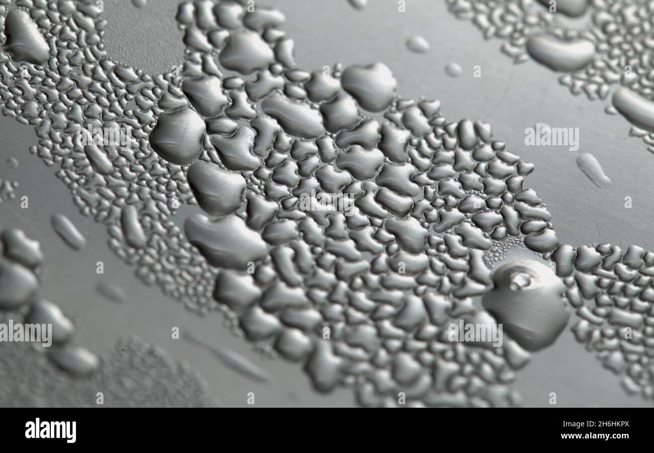 Macro background with water droplets condensation pattern on metal ...